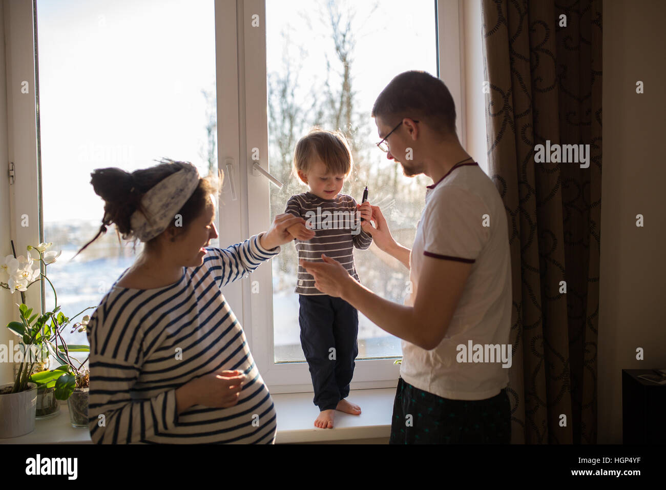 happy family with son kid toddler playing around window, home real ...