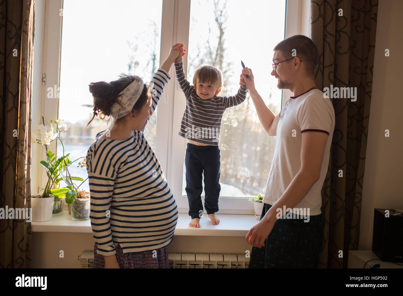 happy family with son kid toddler playing around window, home real ...