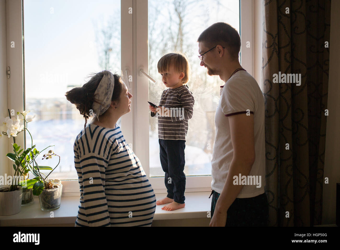 happy family with son kid toddler playing around window, home real ...
