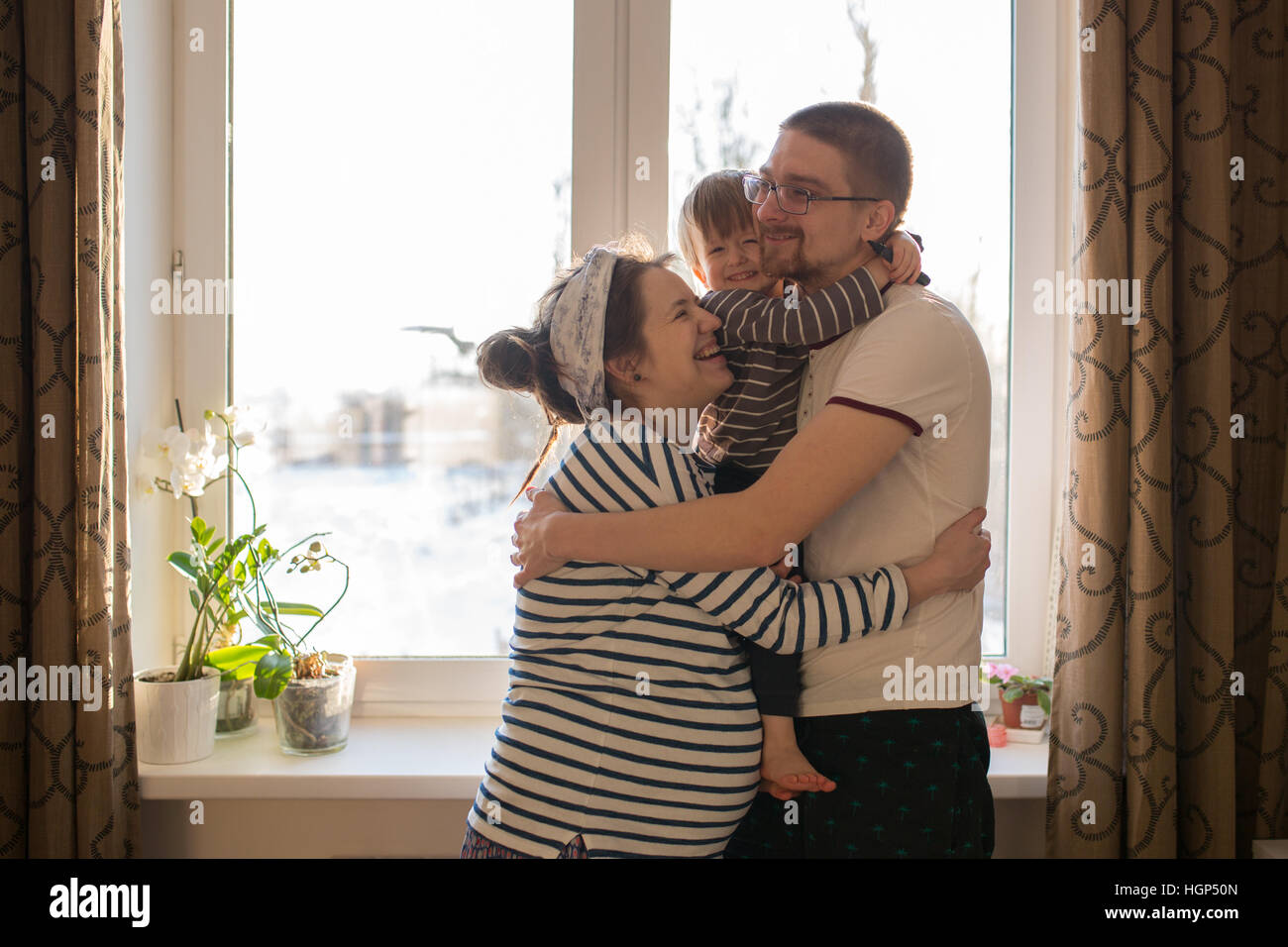 happy family with son kid toddler playing around window, home real ...
