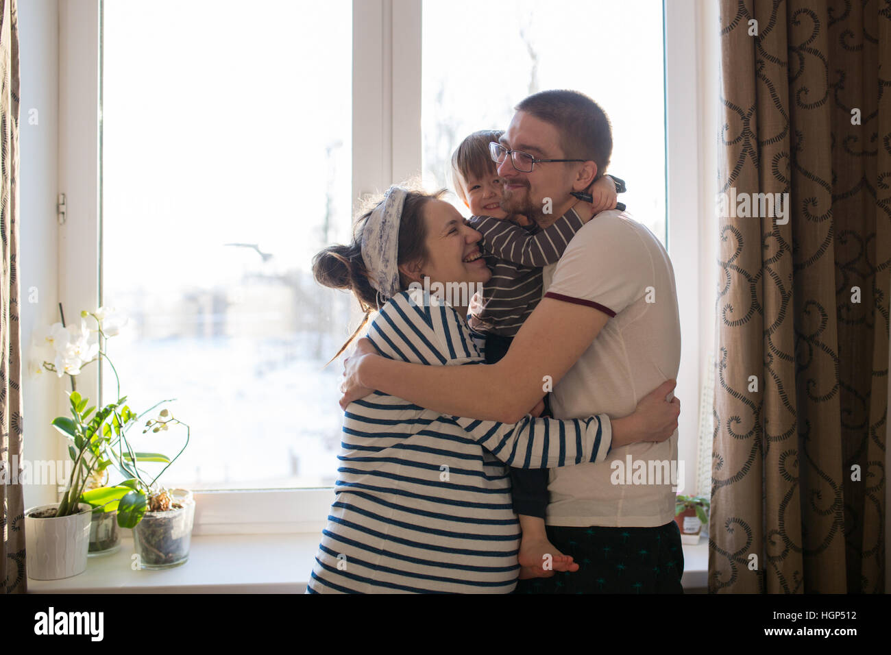 happy family with son kid toddler playing around window, home real ...