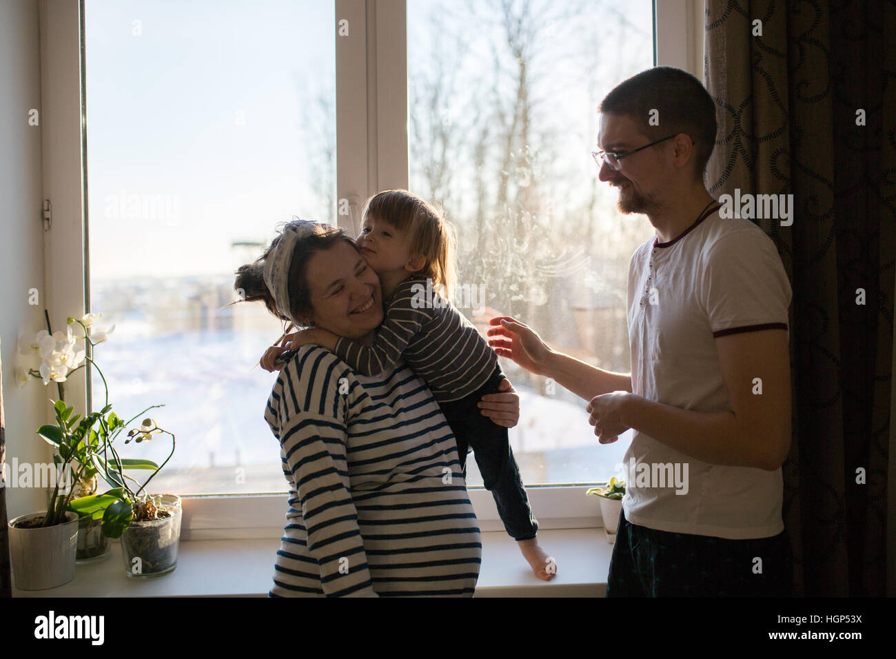 happy family with son kid toddler playing around window, home real ...
