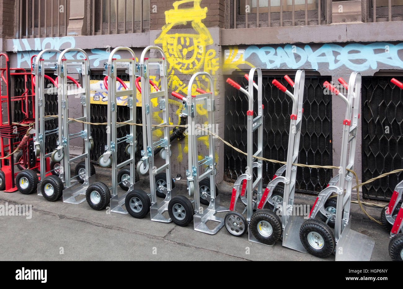 Hand trucks on display in front of a New York City hardware store Stock ...