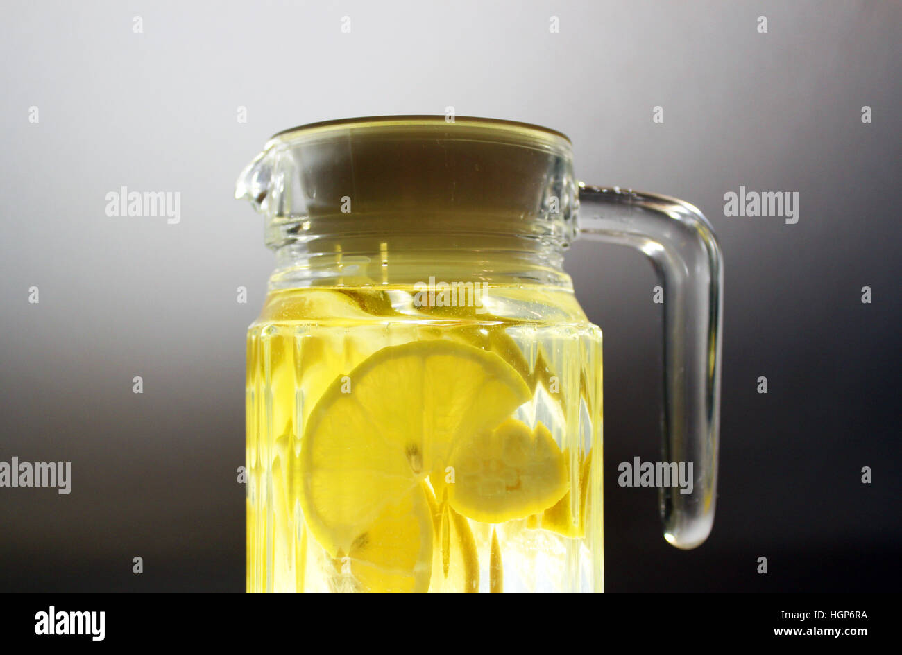 Bottle full of lemonade Stock Photo - Alamy