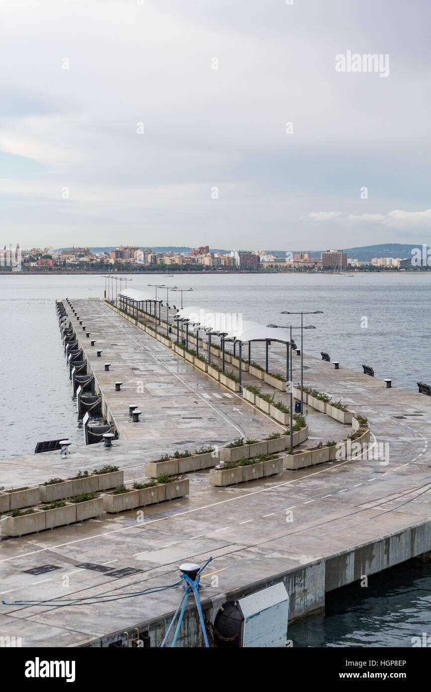 Long Curving Concrete Pier in Majorca Stock Photo - Alamy