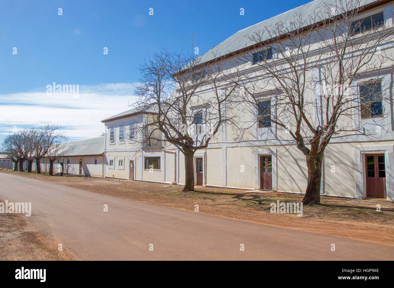 Side view in diminishing perspective of the white Benedictine Monastery ...