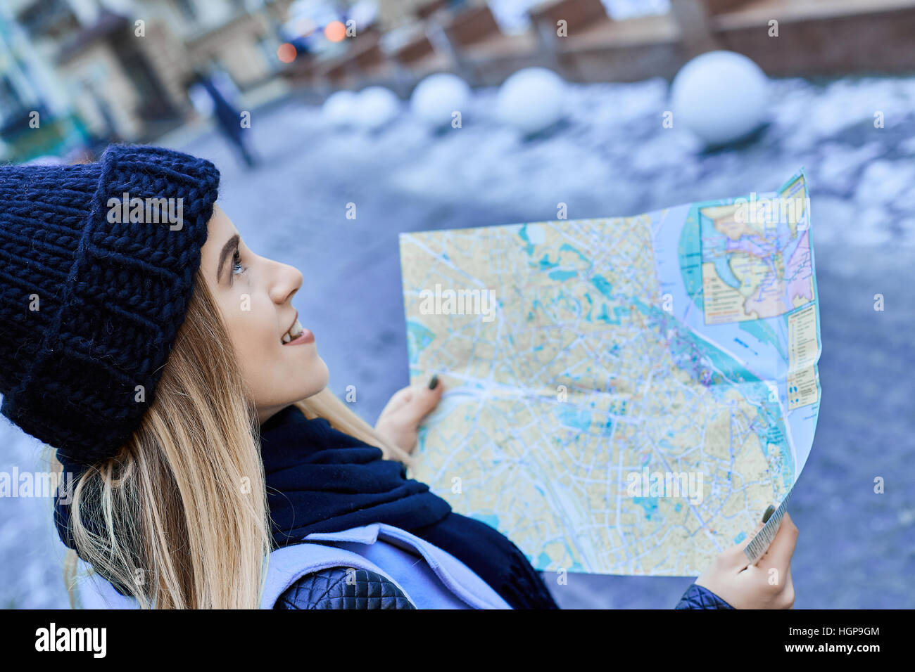 Beautiful girl looking at the map right way in a foreign city Stock ...