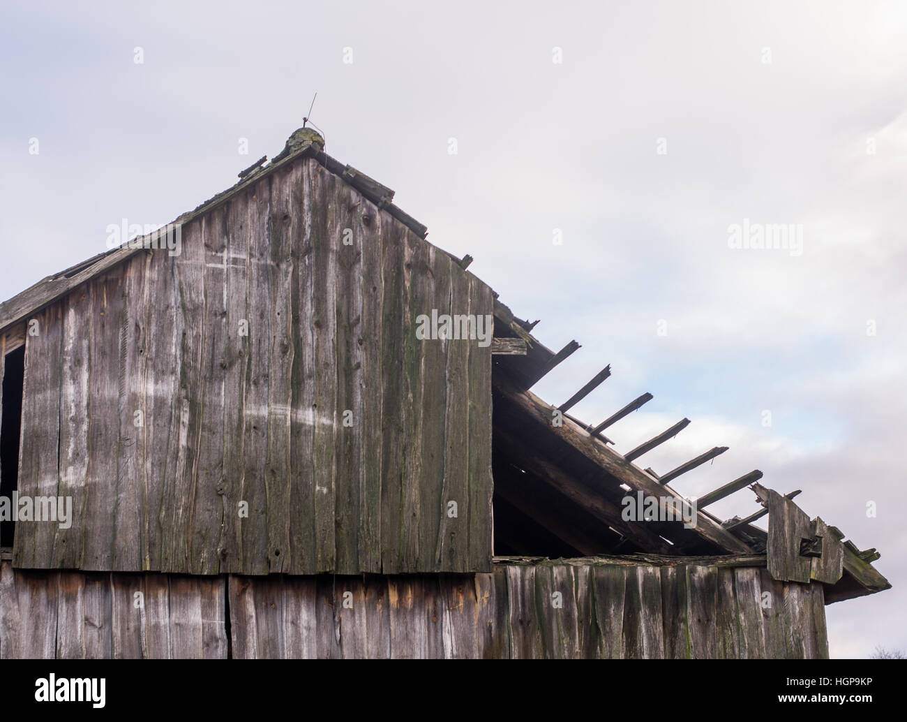 old destroyed barn against blue sky Stock Photo - Alamy