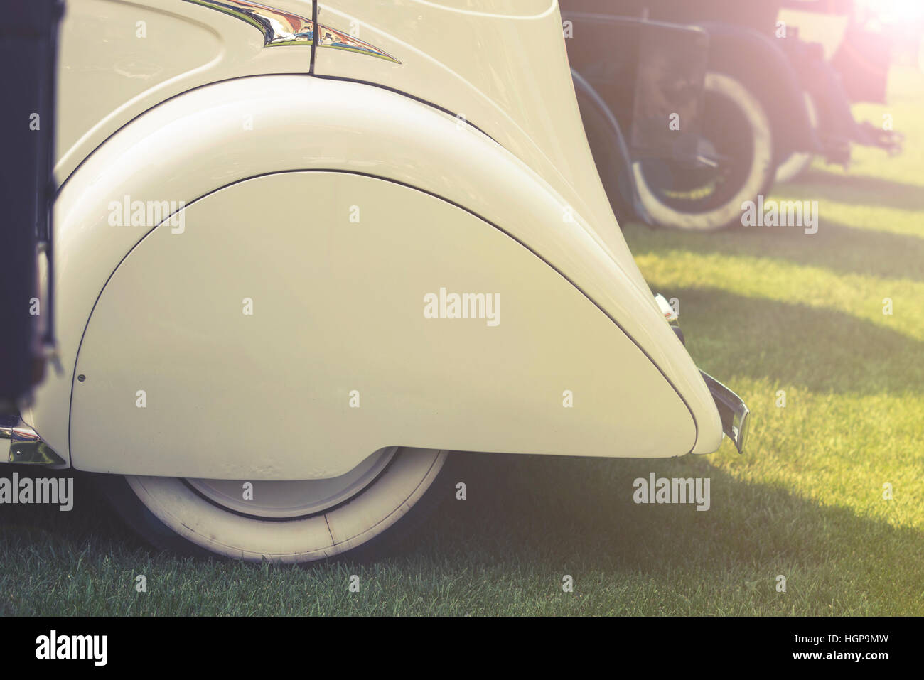 Vintage Car Wheels - Classic Vehicles in line Stock Photo - Alamy
