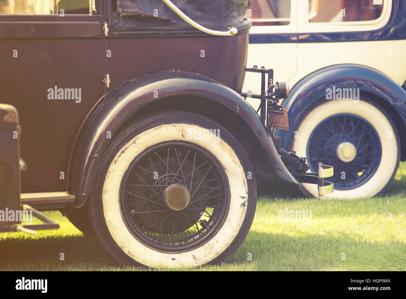 Vintage Car Wheels - Classic Vehicles in line Stock Photo - Alamy