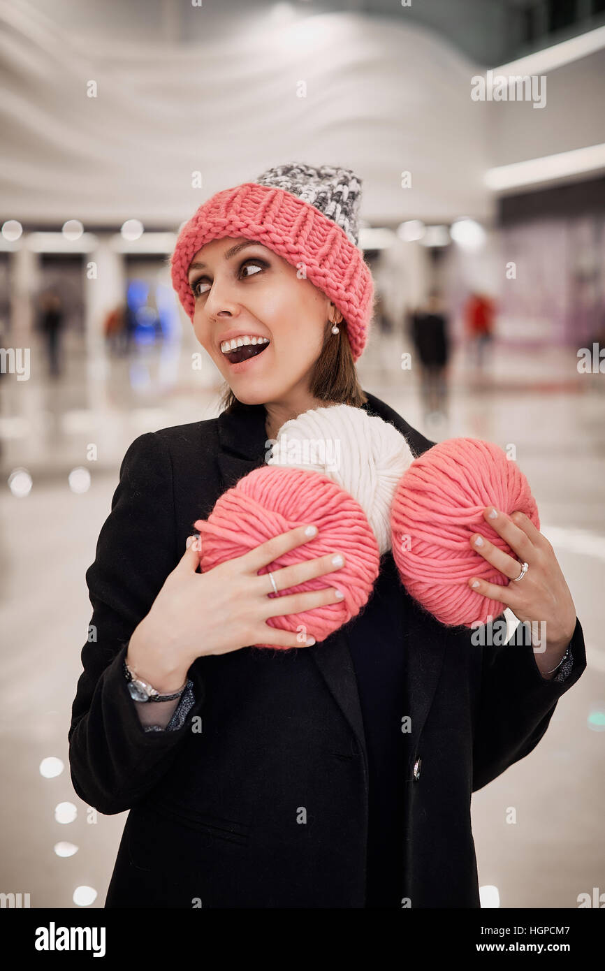 Girl is happy because she has a new thread Stock Photo - Alamy