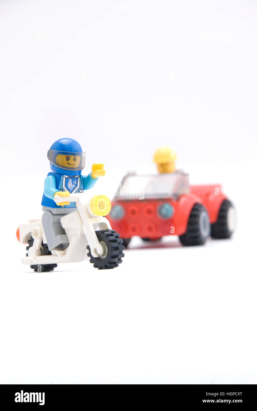 Mini figure Lego driving a motorcycle using helmet Stock Photo - Alamy