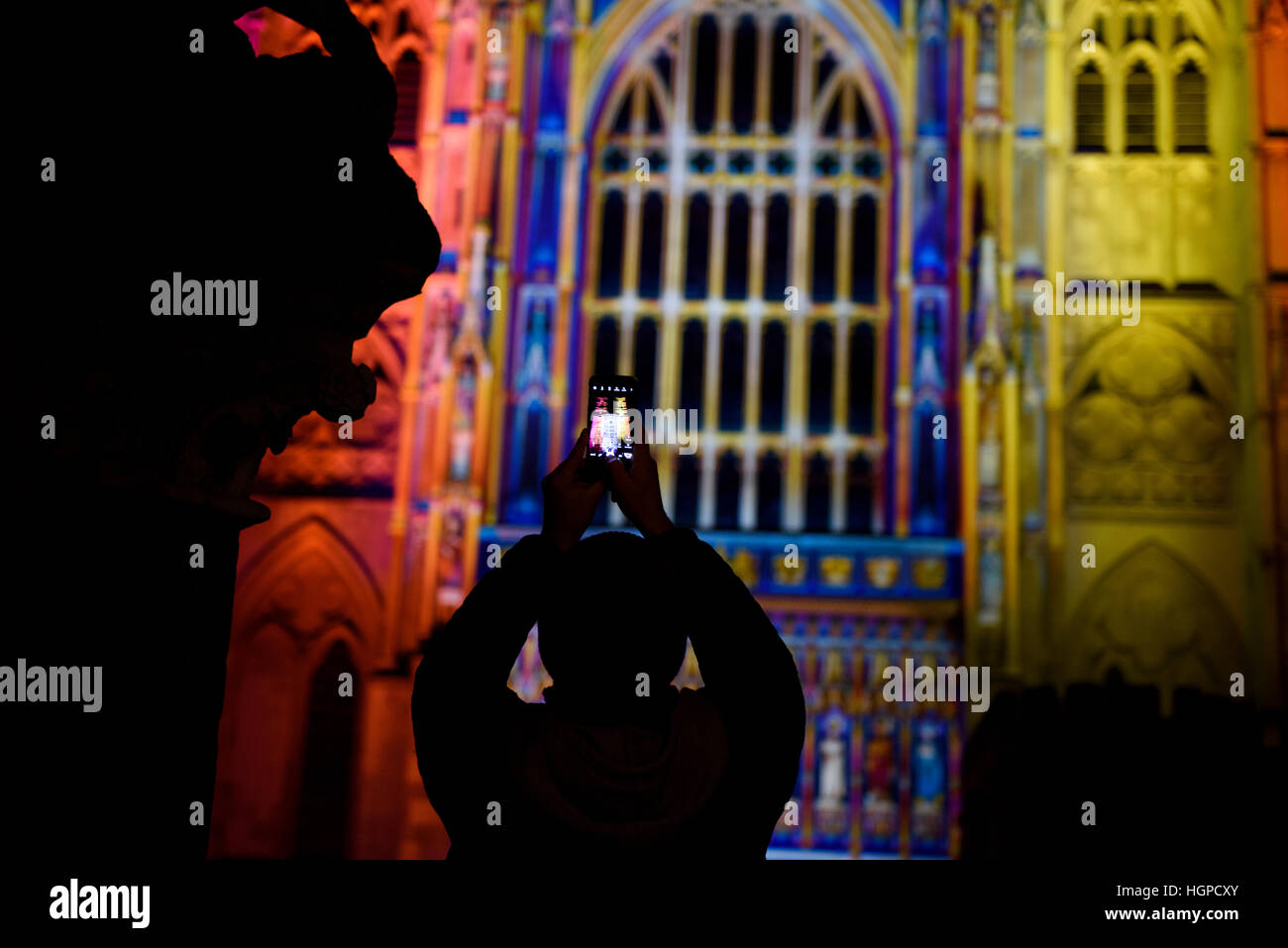 Spectator taking a picture of the installation 'The Light of the Spirit ...