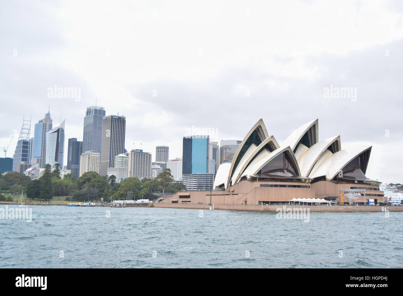 The Sydney Opera House SOH on Bennelong Point next to the Sydney Harbor ...