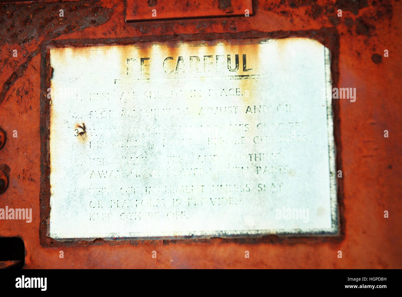 Faded sign on back of old machine, Tyrone, Queensland, Australia Stock ...