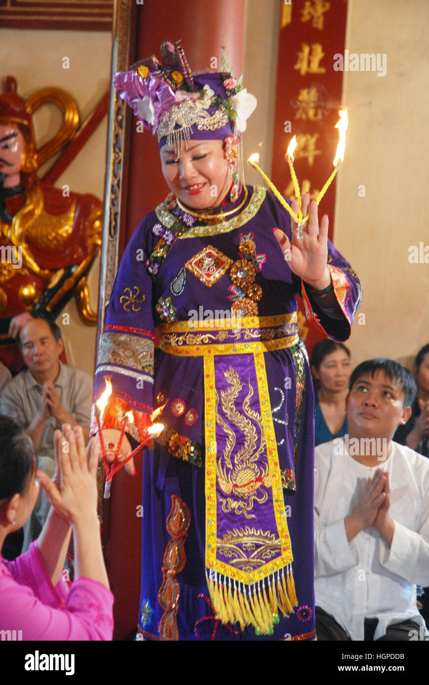 A Priestess at a Temple in Hanoi, handing out money, Vietnam Stock ...