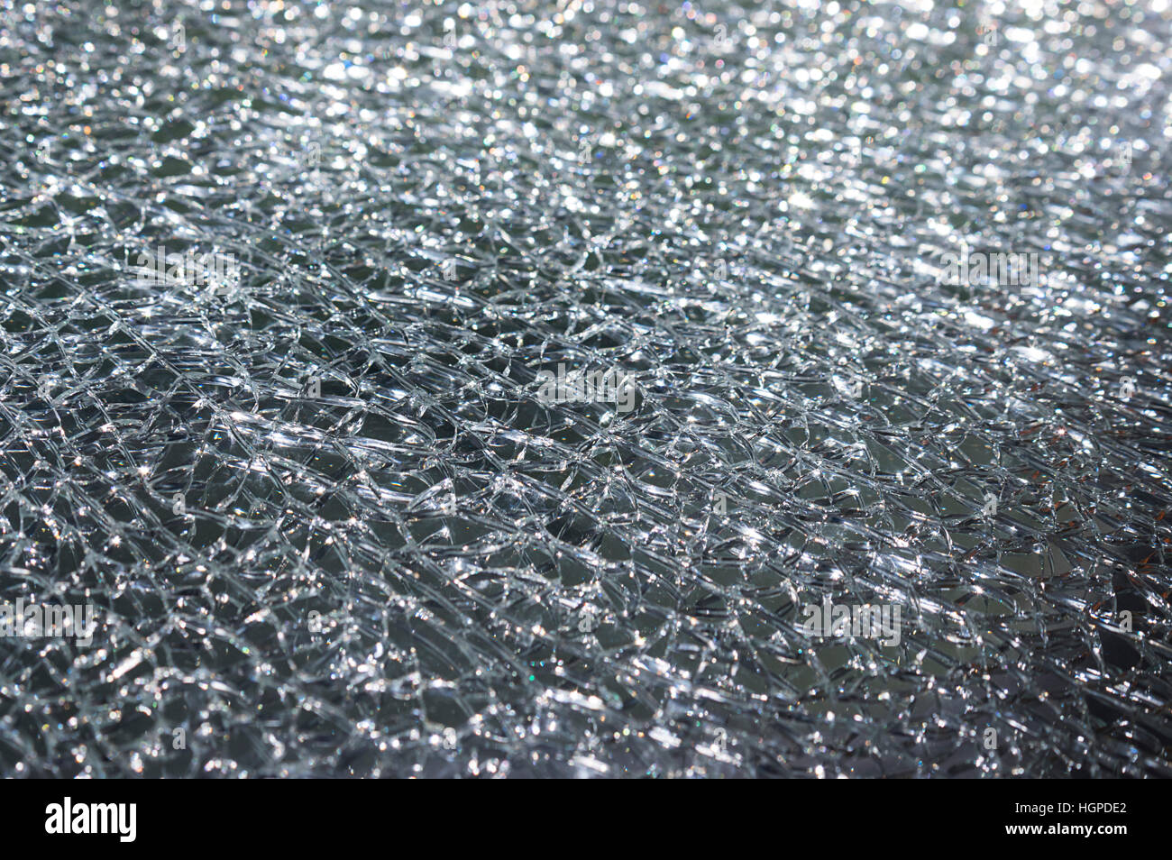 Broken silver mirror glass with bokeh Stock Photo - Alamy