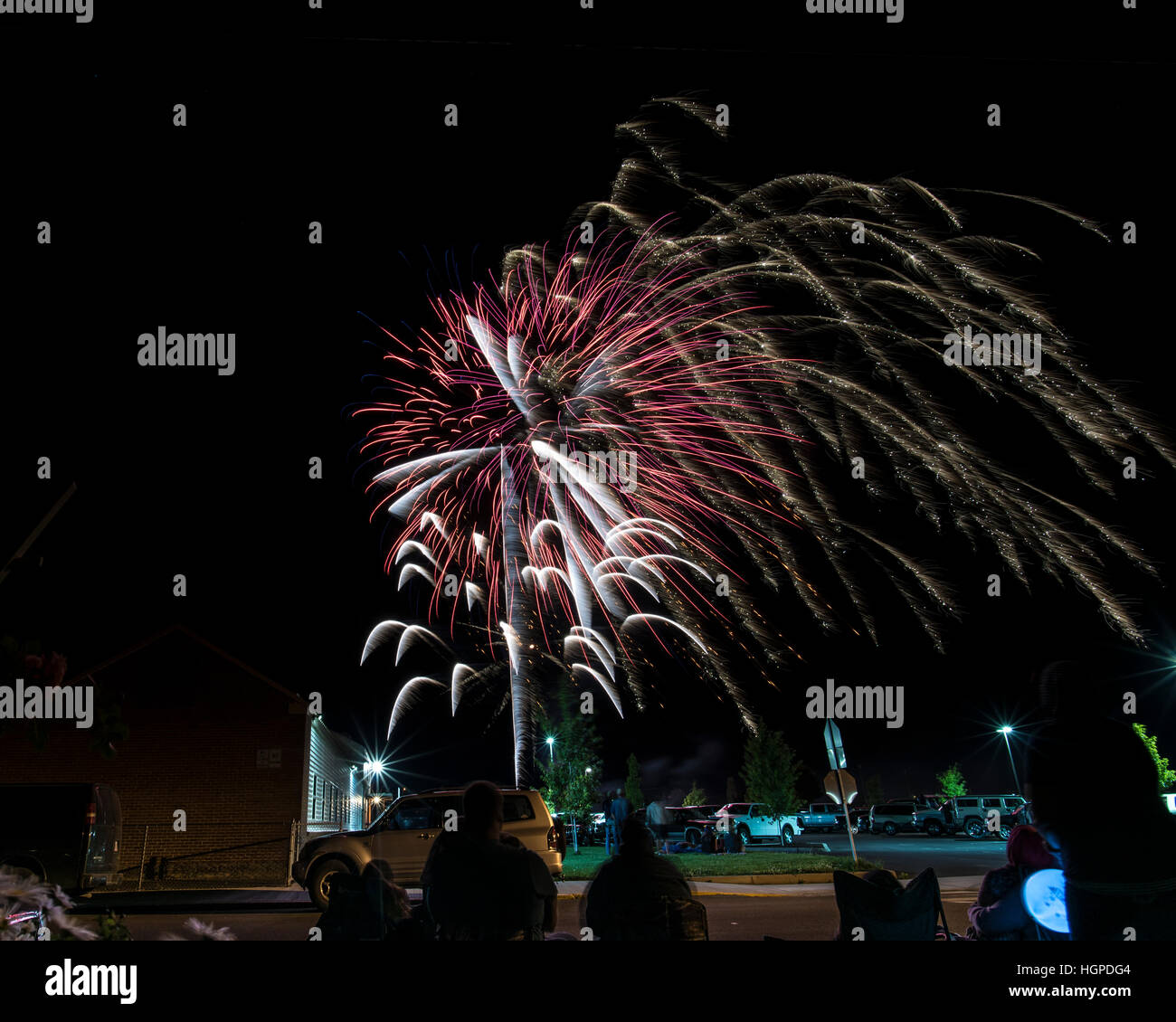 The back of people watching a fireworks display Stock Photo - Alamy