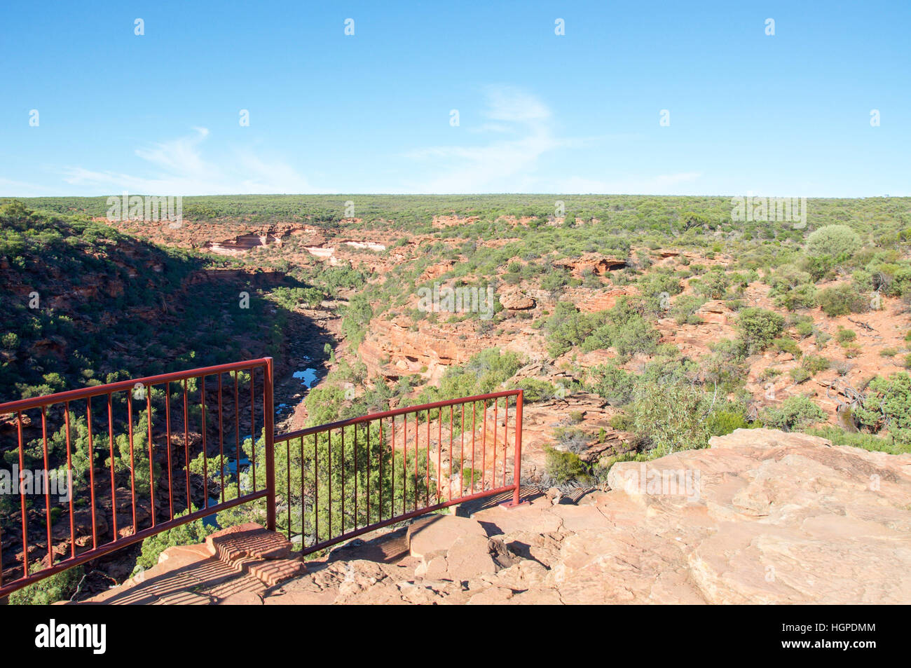 Z-bend lookout with sandstone cliff and railing overlooking the river ...