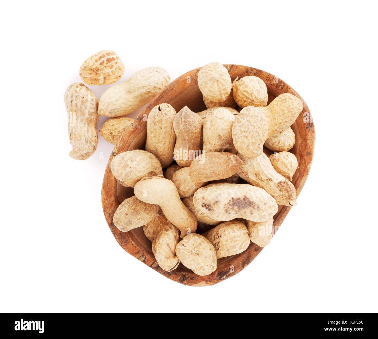Peanut nuts in bowl. Isolated on white background Stock Photo - Alamy