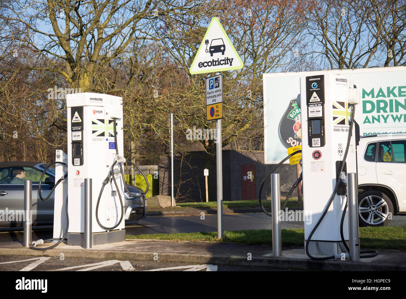 Electric cars at charging station uk hi-res stock photography and images - Alamy