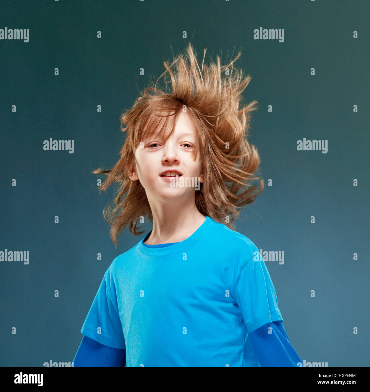 Portrait of a Boy with his Hair Flying in the Air Stock Photo - Alamy