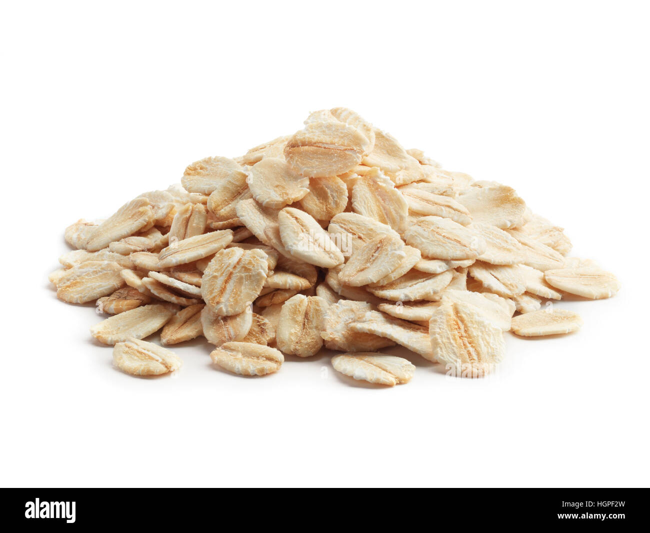 pile of oatmeal isolated on white background Stock Photo - Alamy