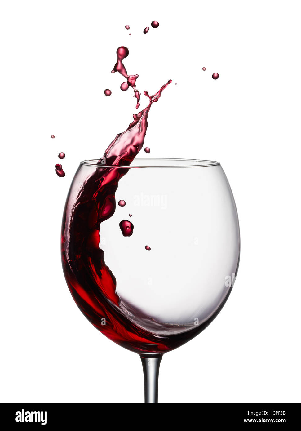 glass of splashing red wine isolated on white Stock Photo - Alamy