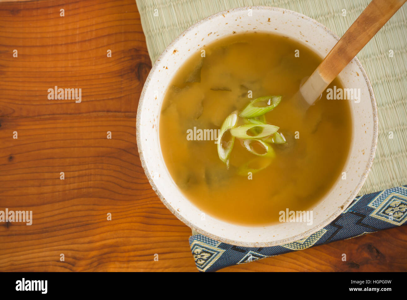 Japanese yellow awase or mixed miso soup with chopped spring onion or ...