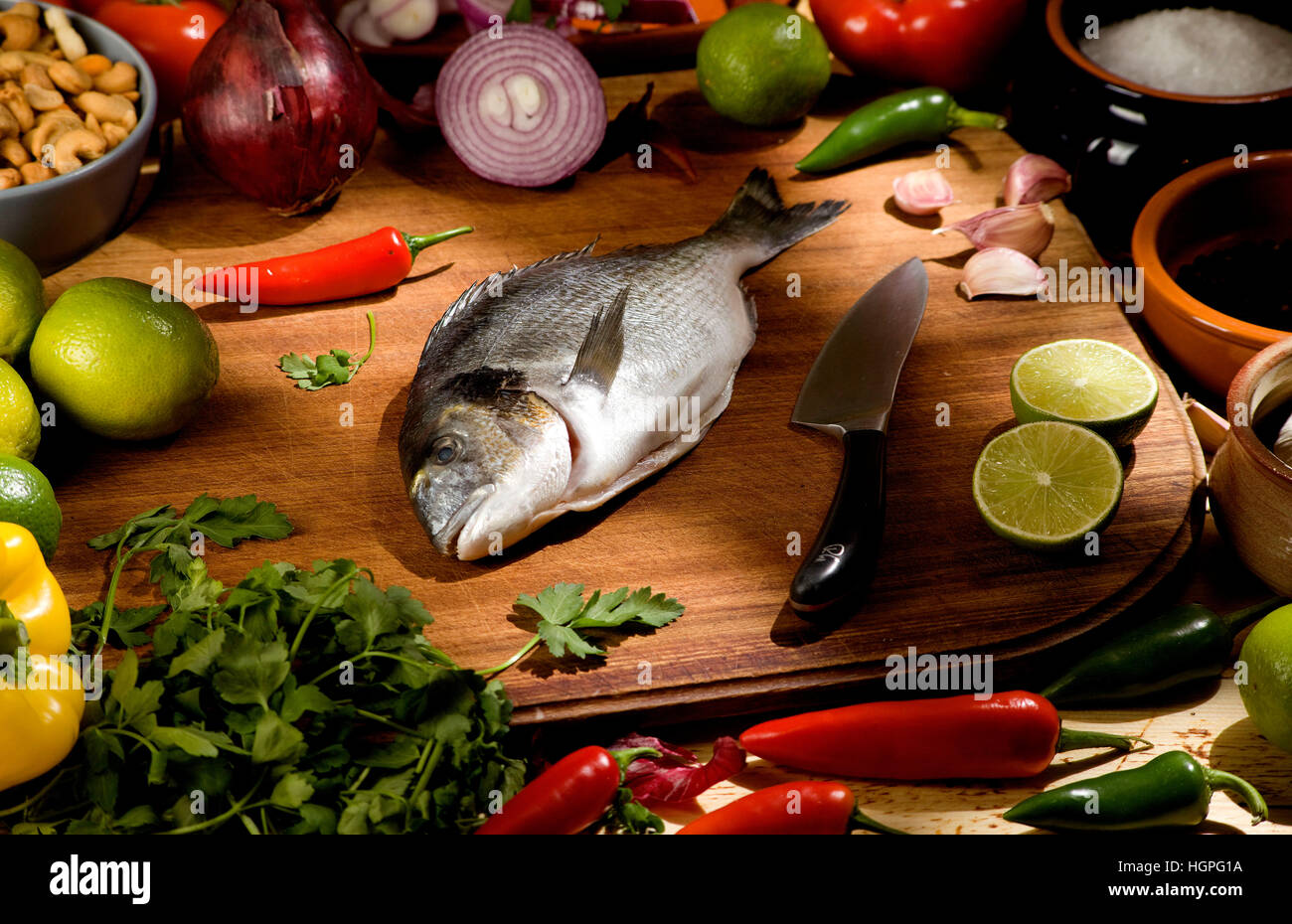 whole uncooked sea bream with ingredients Stock Photo - Alamy