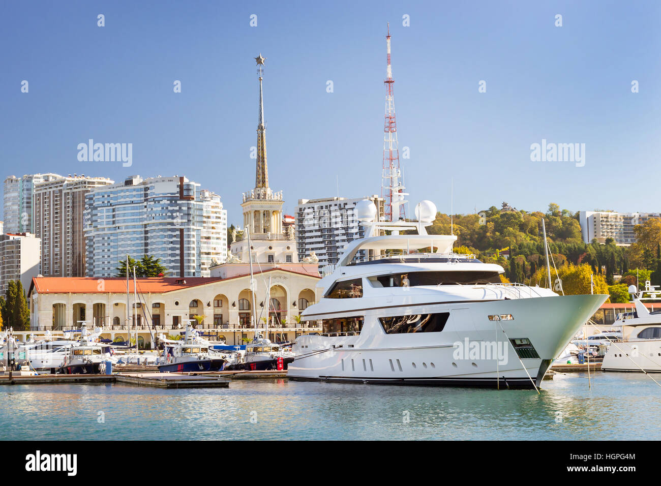 Sochi sea port view from water. Luxury yachts and private boats moored ...
