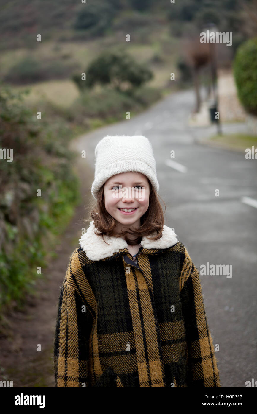 Beautiful girl with wool hat at winter in the street Stock Photo - Alamy