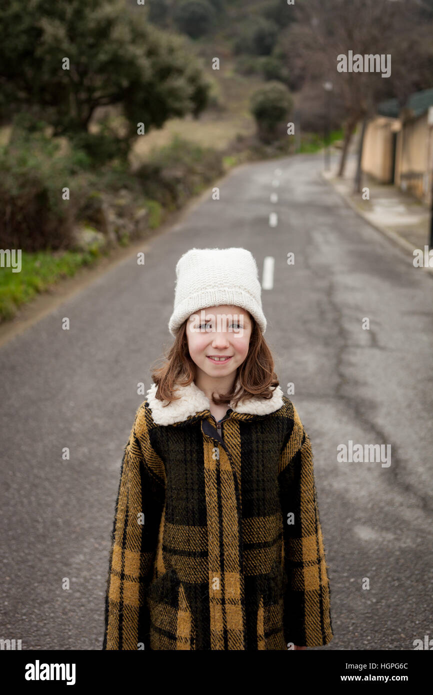 Beautiful girl with wool hat at winter in the street Stock Photo - Alamy