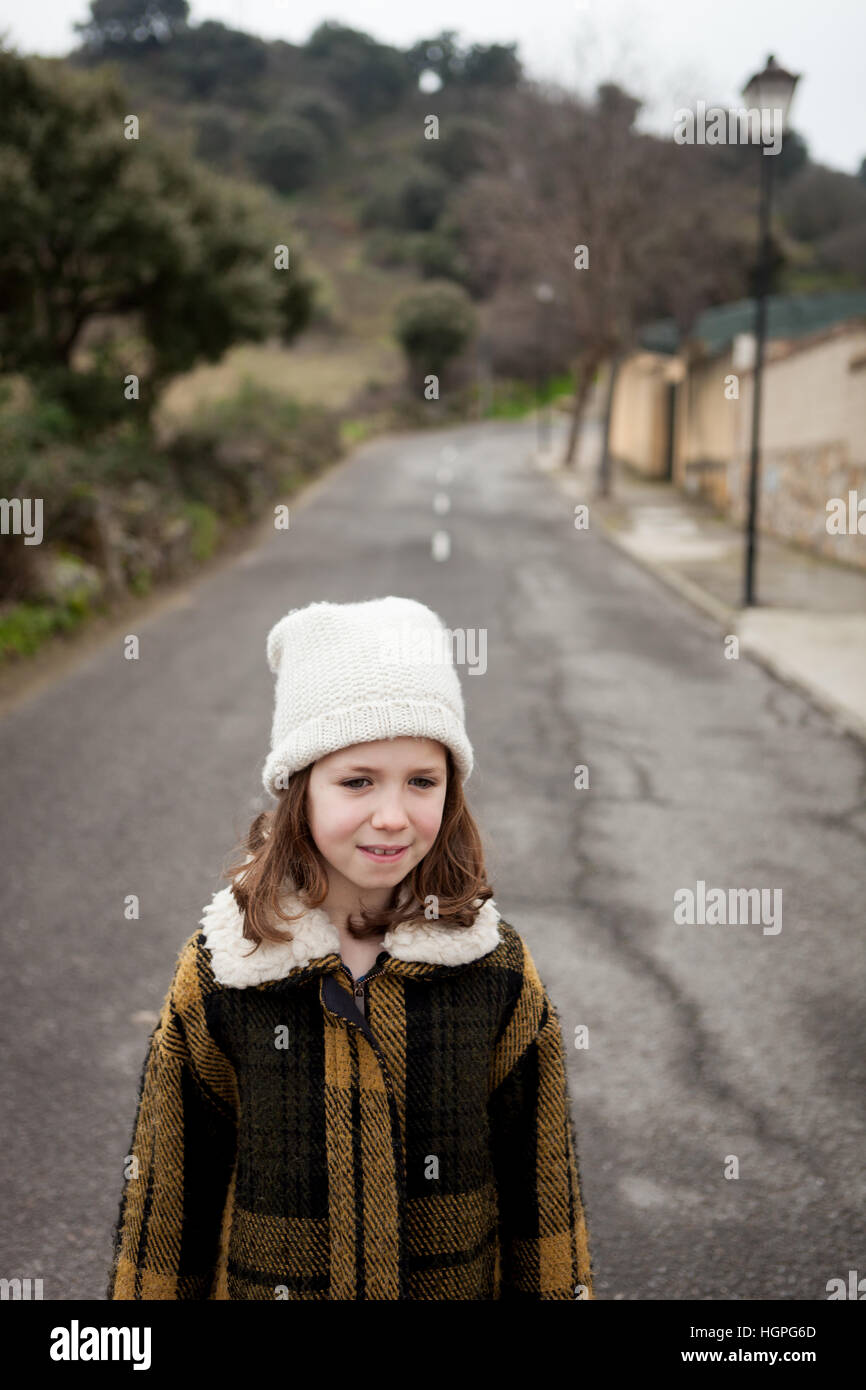 Beautiful girl with wool hat at winter in the street Stock Photo - Alamy