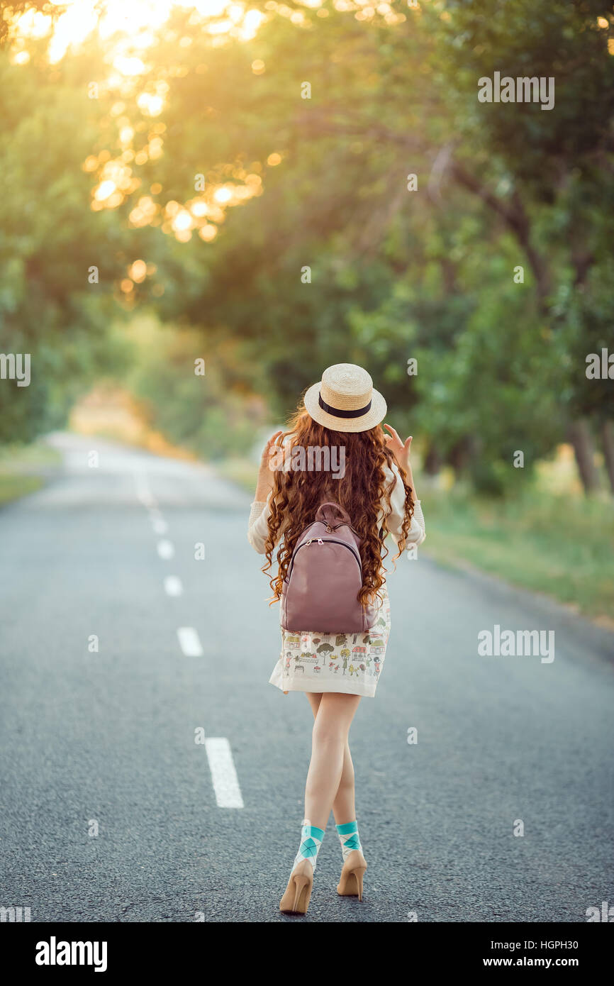 Beautiful young woman traveling Stock Photo - Alamy