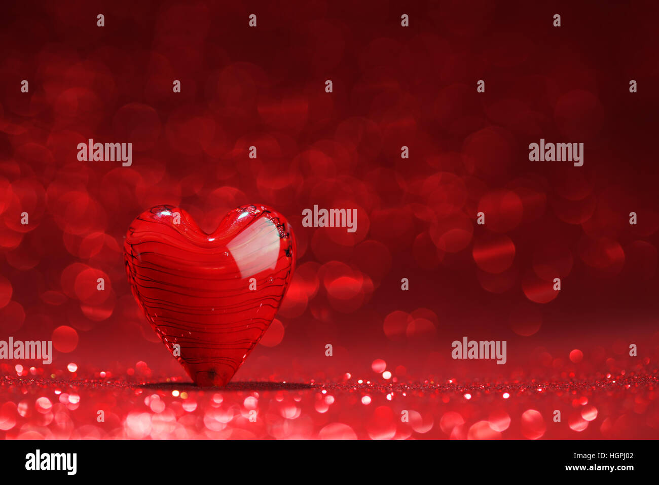 Shiny red heart background Stock Photo - Alamy