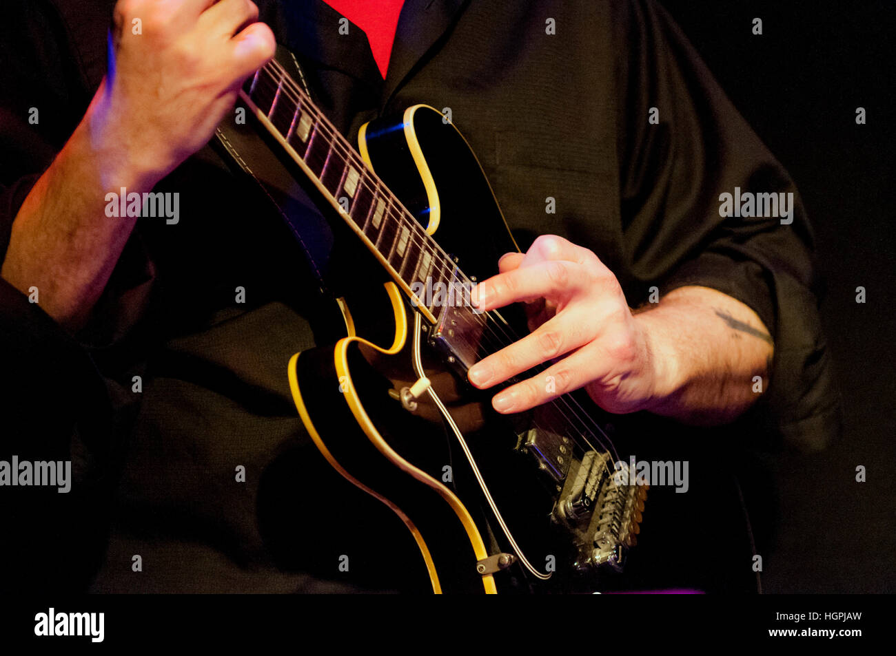 electric guitar player live on stage Stock Photo - Alamy
