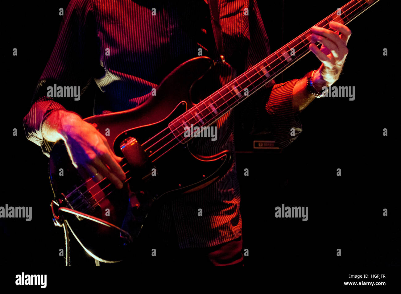 bass guitar player live on stage Stock Photo - Alamy
