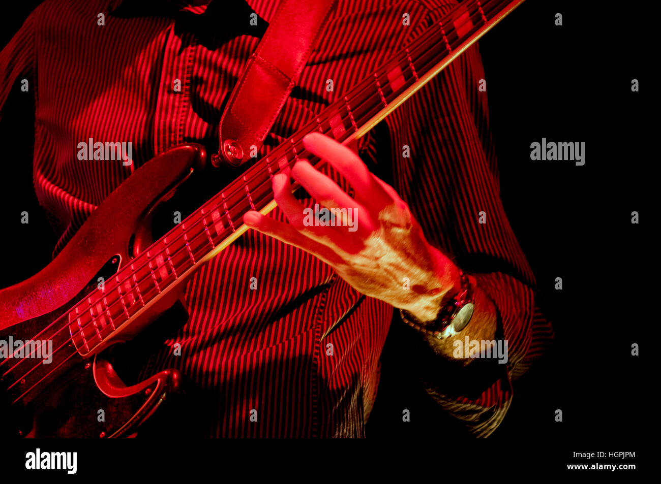 bass guitar player live on stage Stock Photo - Alamy
