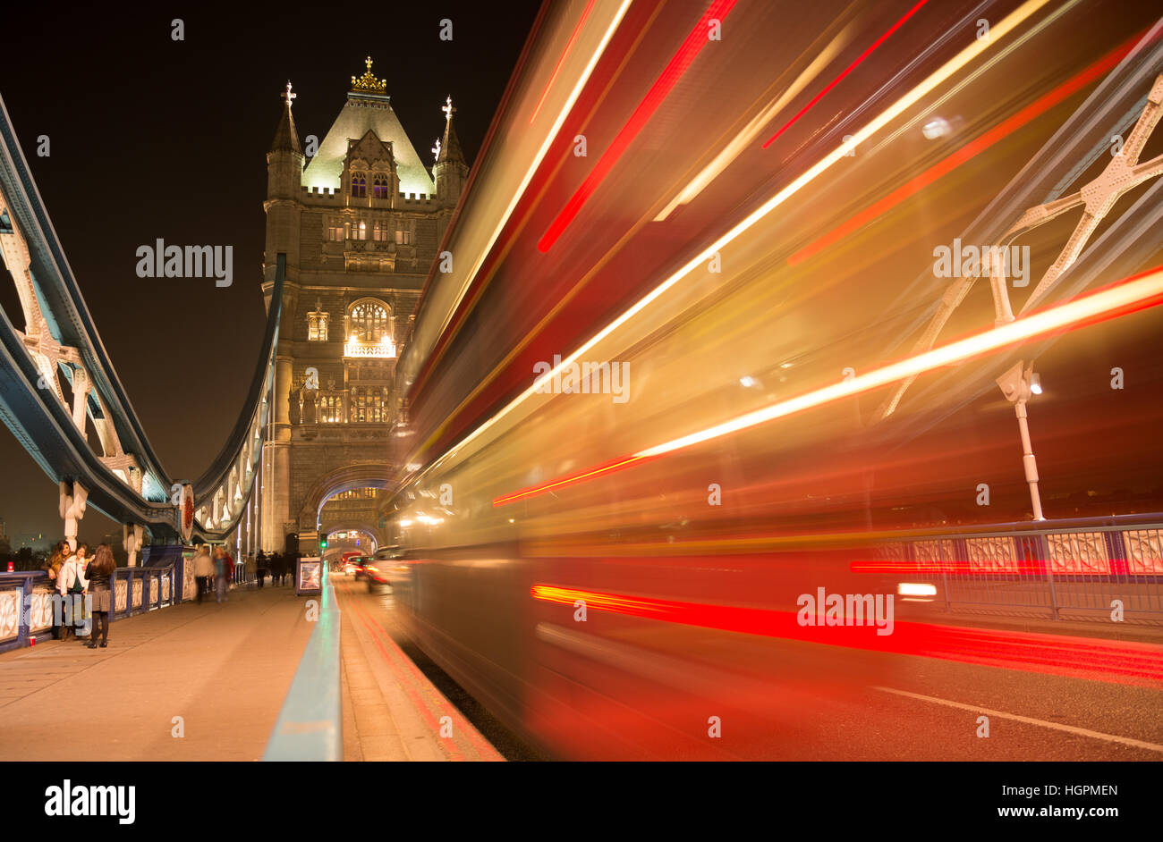 red london bus passing over tower bridge in london, england, Britain ...