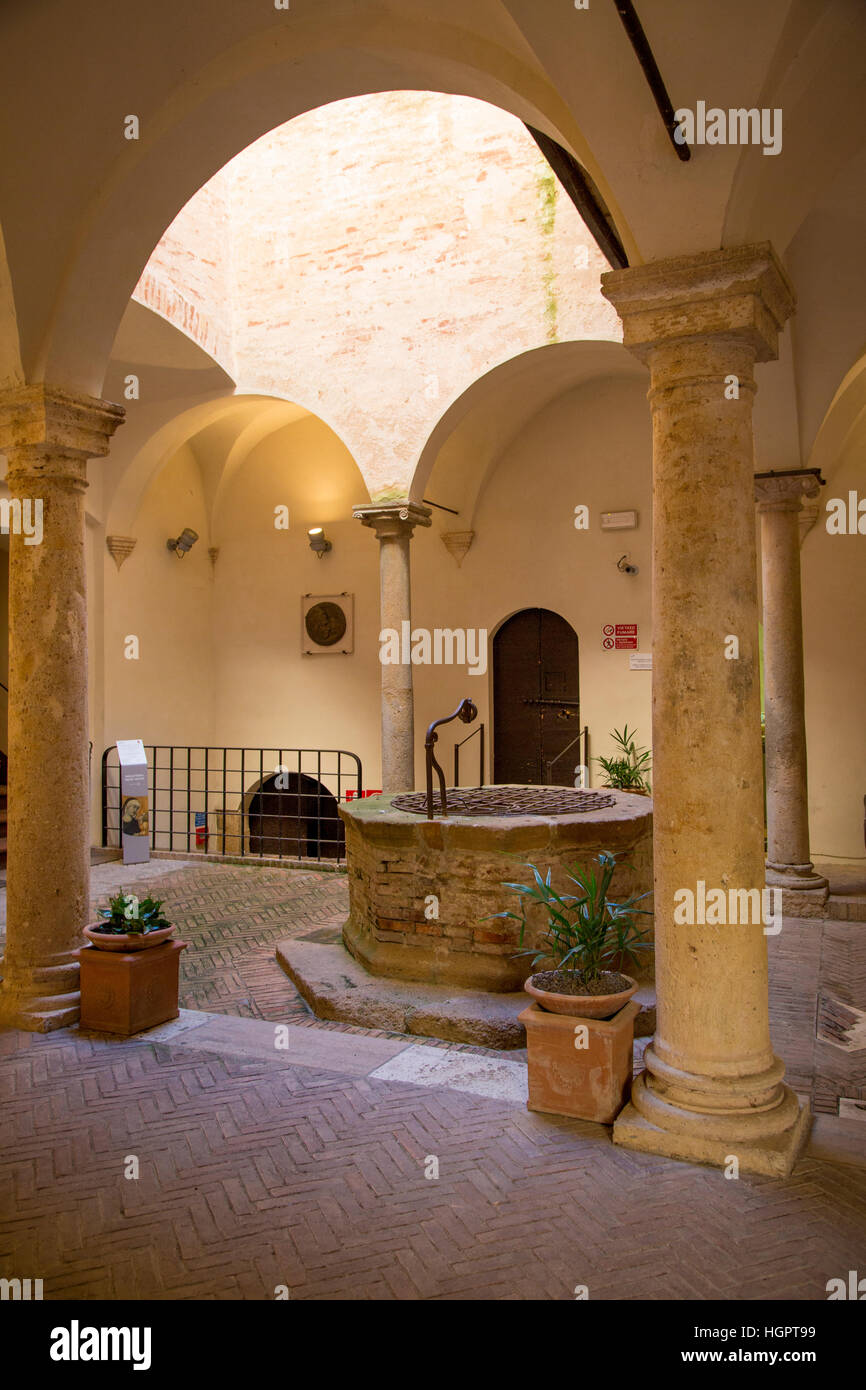 Ancient water well inside Museo Diocesano in medieval town of Pienza ...
