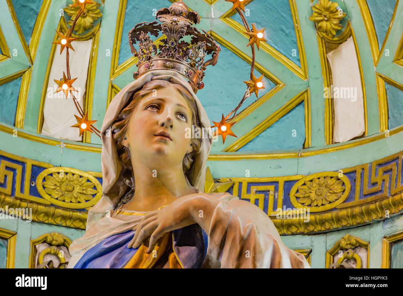 Blessed Virgin Mary surrounded by stars holding hand on chest Stock ...