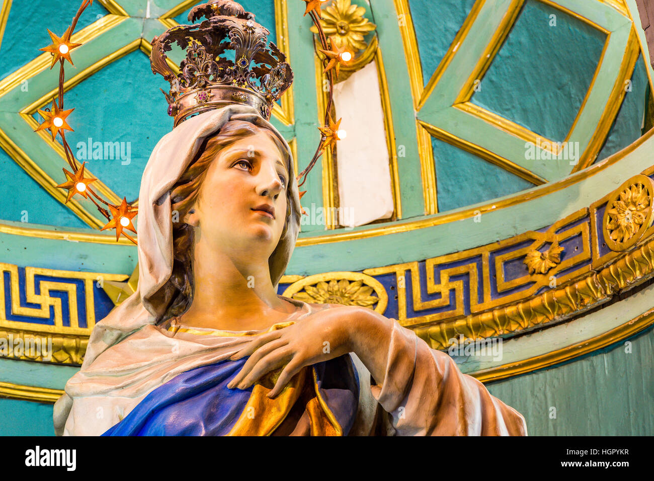 Blessed Virgin Mary surrounded by stars holding hand on chest Stock ...