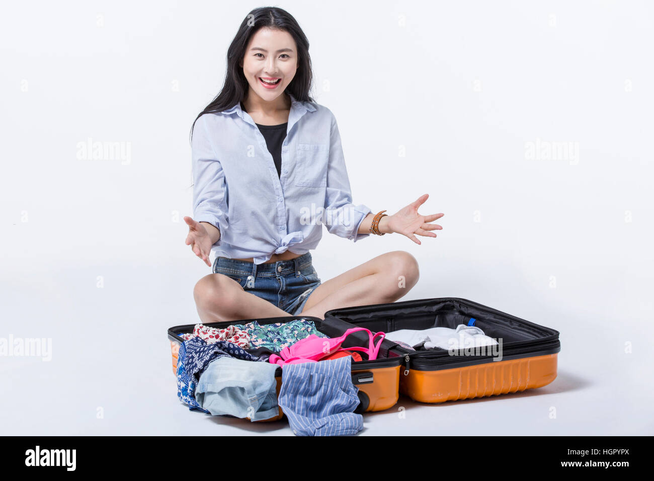 Woman female folding clothing clothes hi-res stock photography and images - Alamy