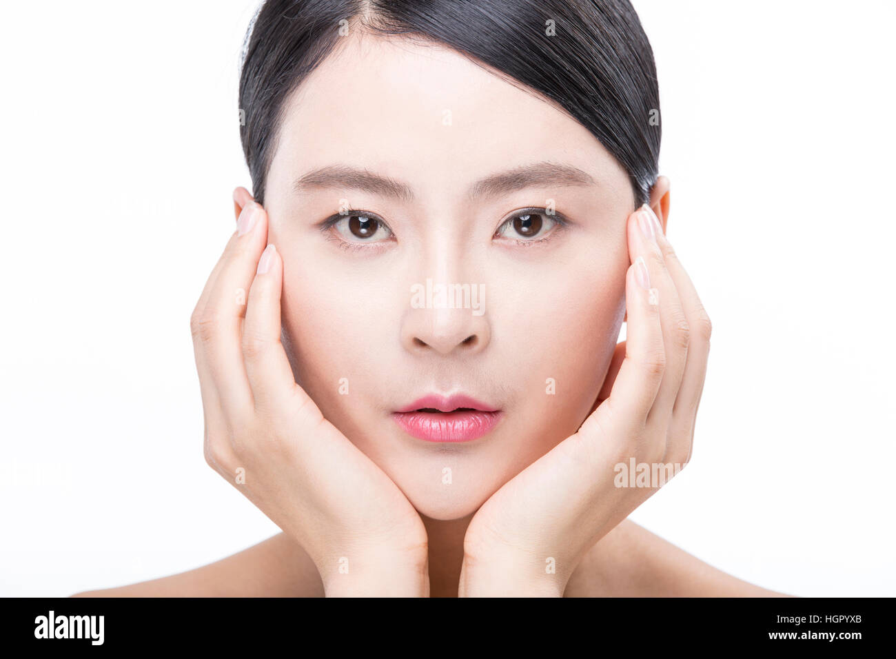 Portrait of young woman wrapping her face Stock Photo - Alamy