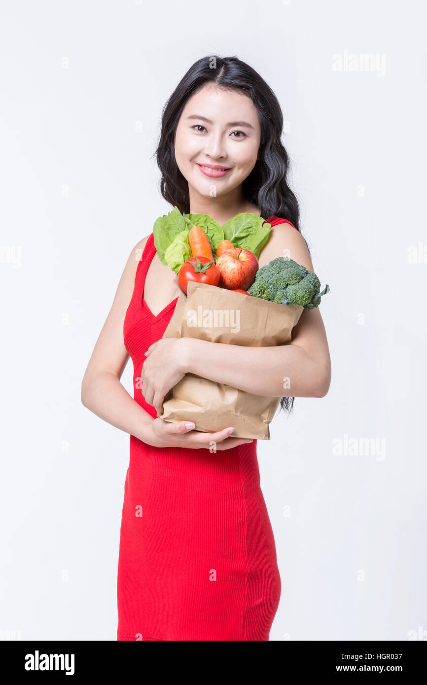 Woman red dress bag hi-res stock photography and images - Alamy
