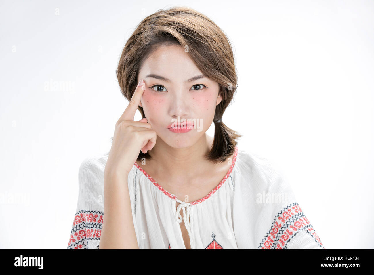 Portrait of young angry woman Stock Photo - Alamy