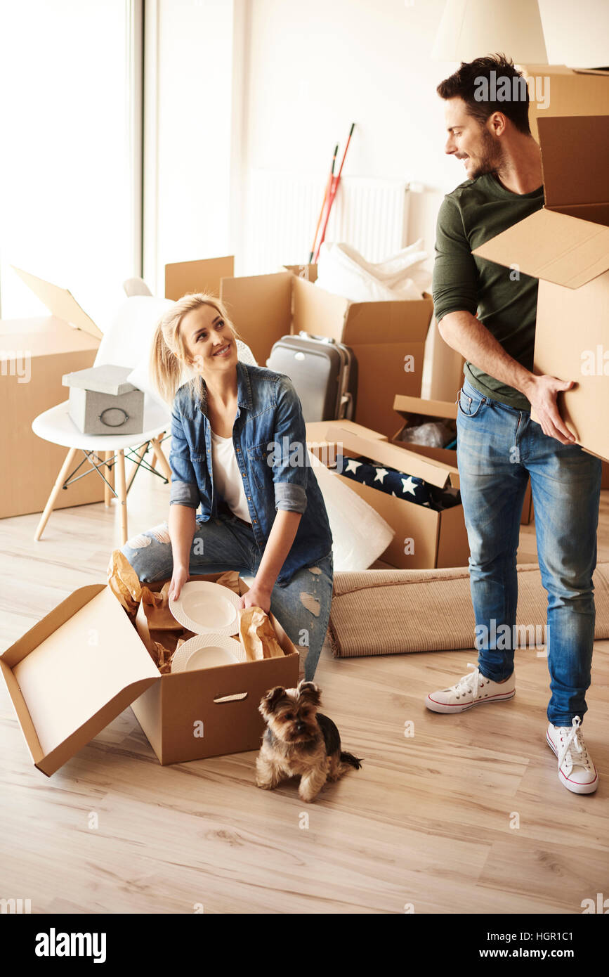 Young couple stepping into new life together Stock Photo - Alamy