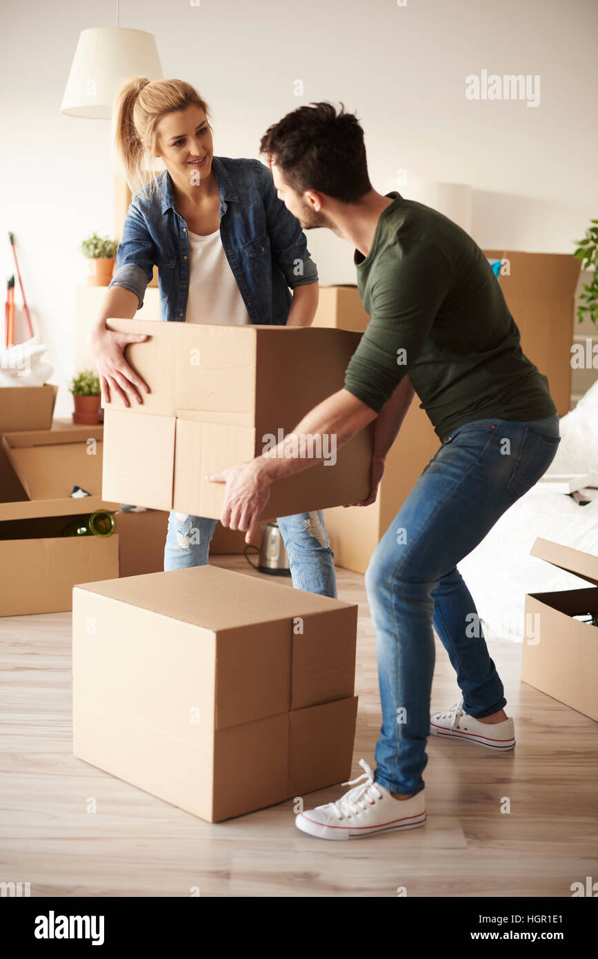 Couple laying cardboard boxes on the stack Stock Photo - Alamy