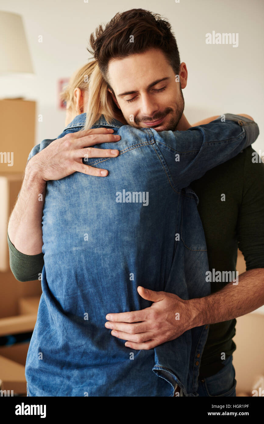 Couple hugging in their love nest Stock Photo - Alamy